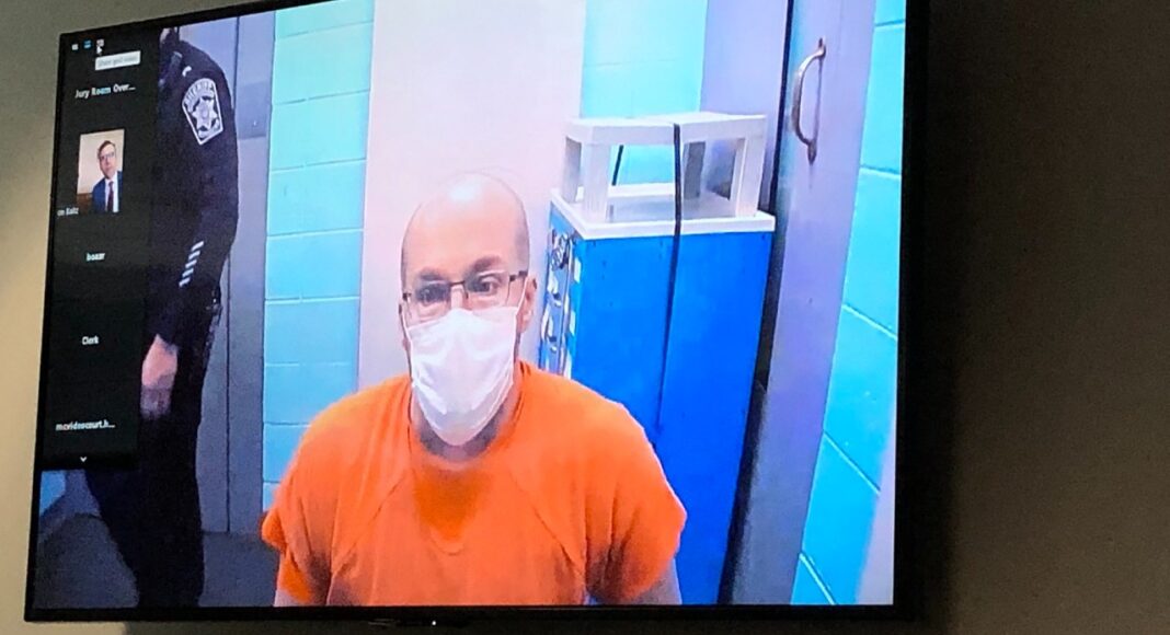 Former Aurora pharmacist accused of destroying COVID-19 vaccine doses ...
