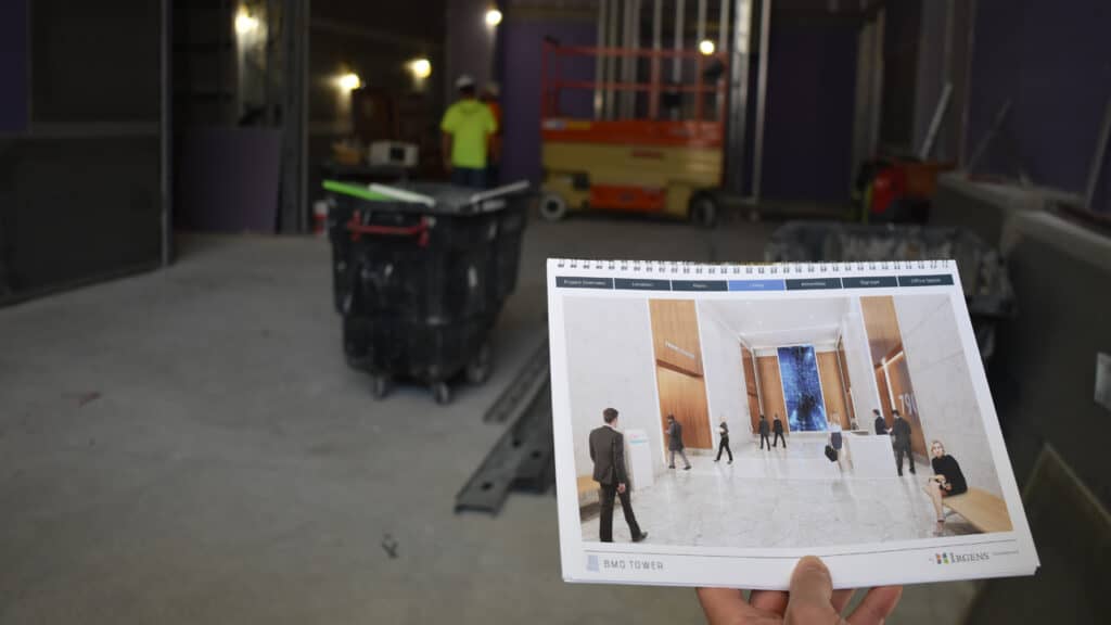 See photos: Installation of BMO Tower's glass exterior slated for ...