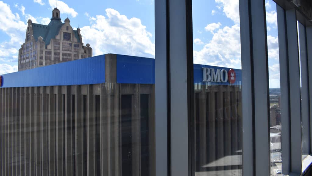 See photos: Installation of BMO Tower's glass exterior slated for ...